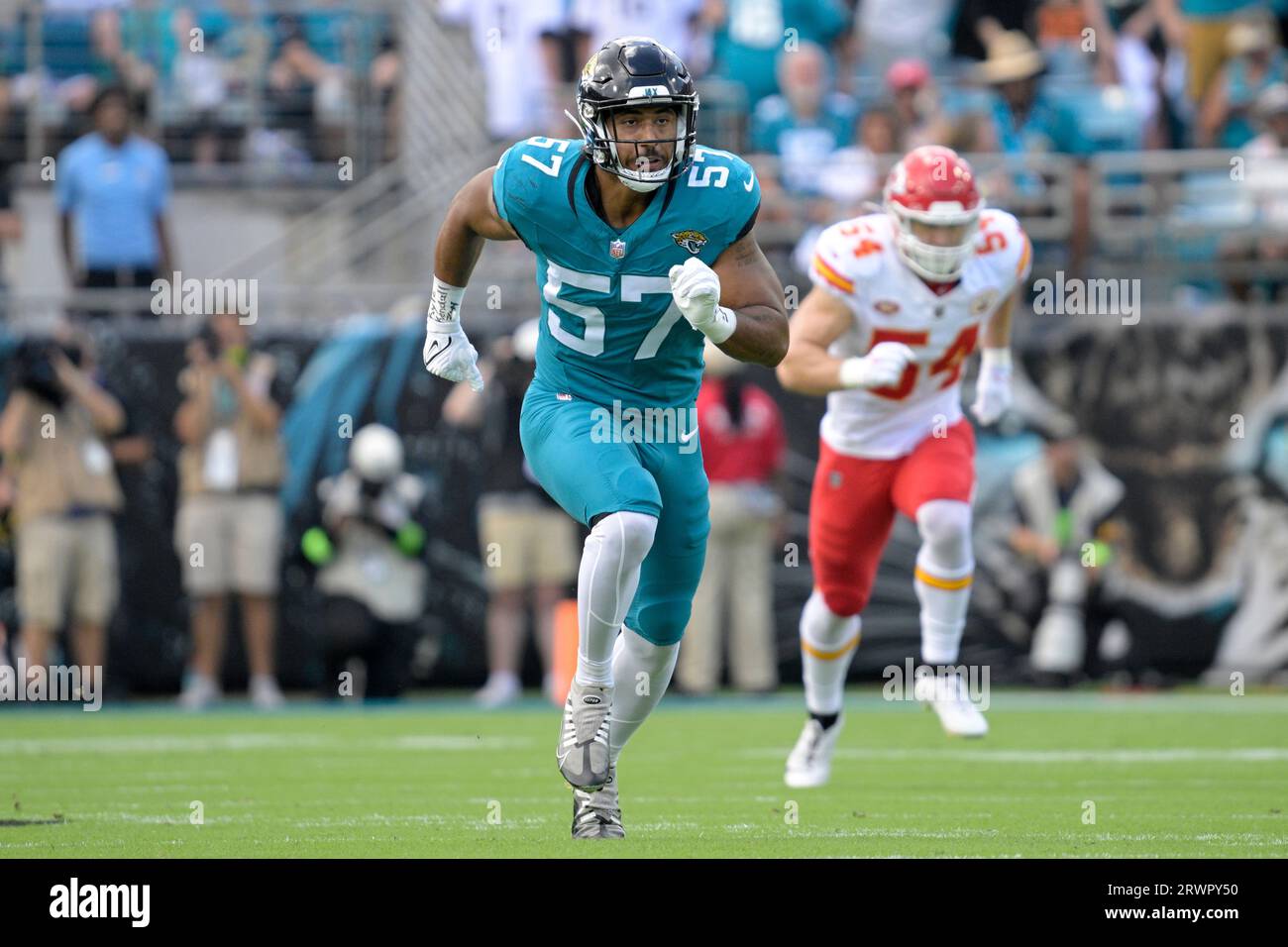 Jacksonville Jaguars linebacker Caleb Johnson (57) follows a play during the first half of an ...