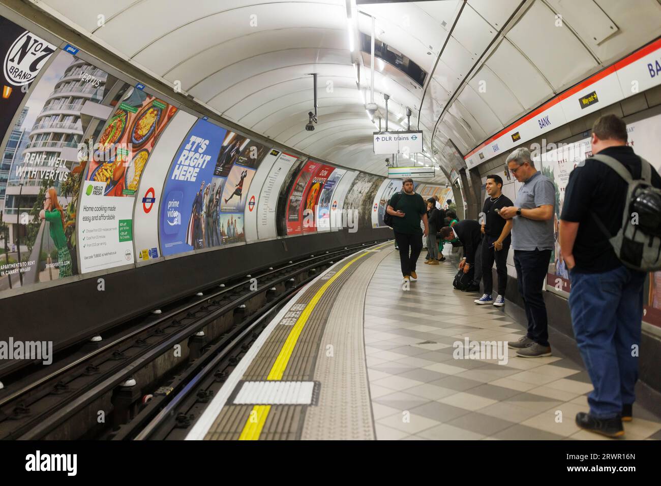 The curved platform at Bank Station on the central line, London ...