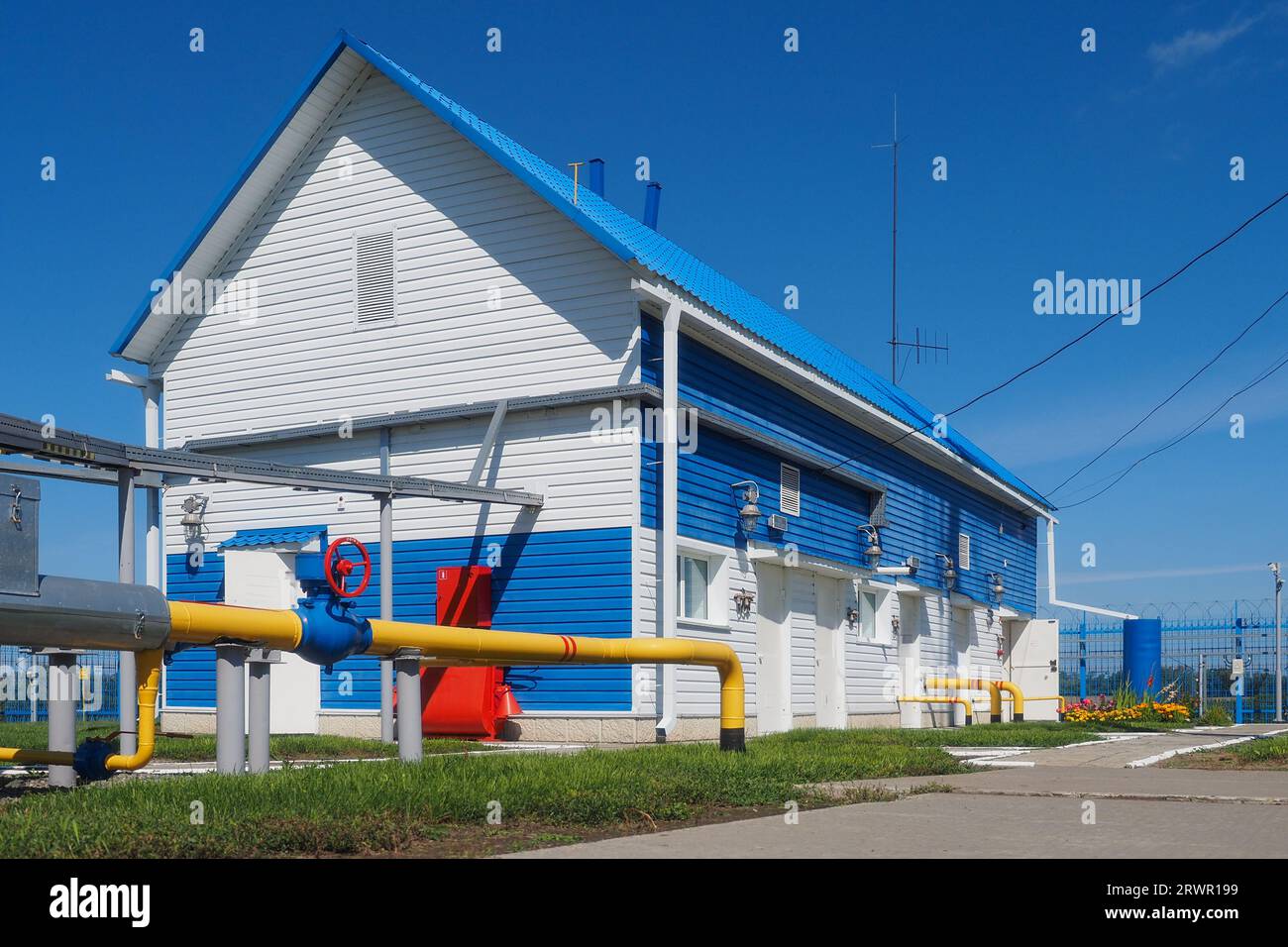 View of territory of gas distribution station from outside on sunny ...