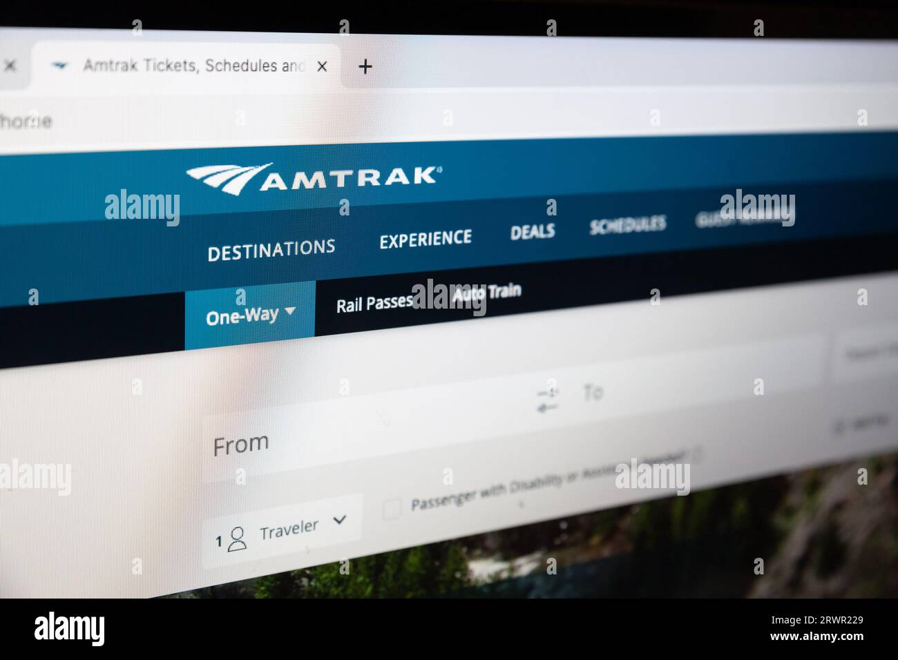 Picture of a sign with the logo of Amtrak on their website. The ...
