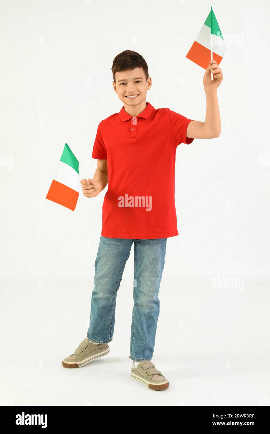 Little boy with flags of Italy on light background Stock Photo - Alamy