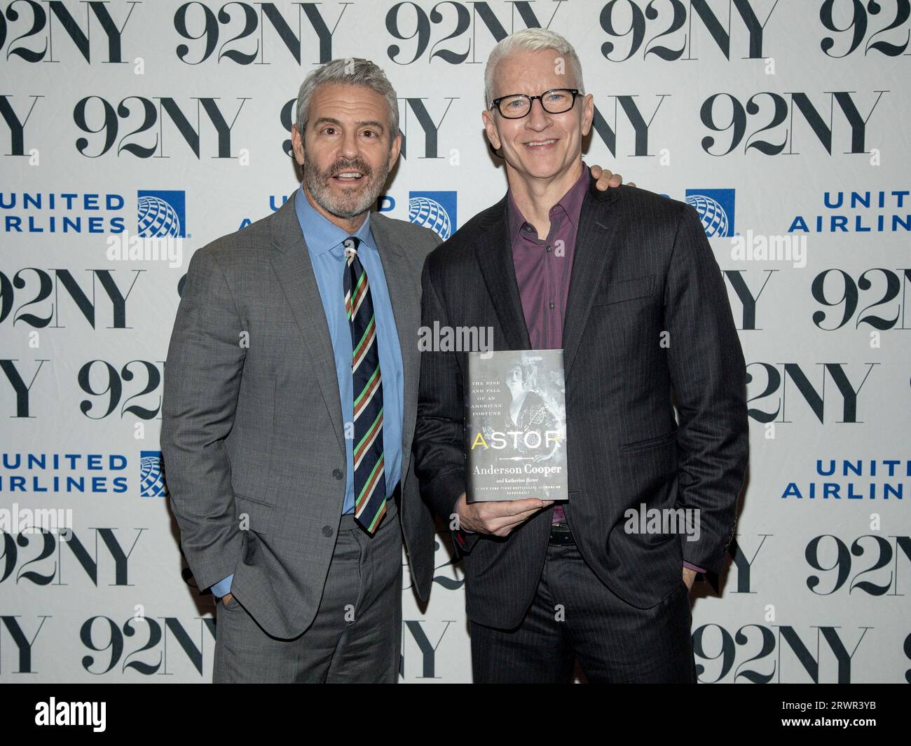 Andy Cohen, left, and Anderson Cooper pose together backstage before ...