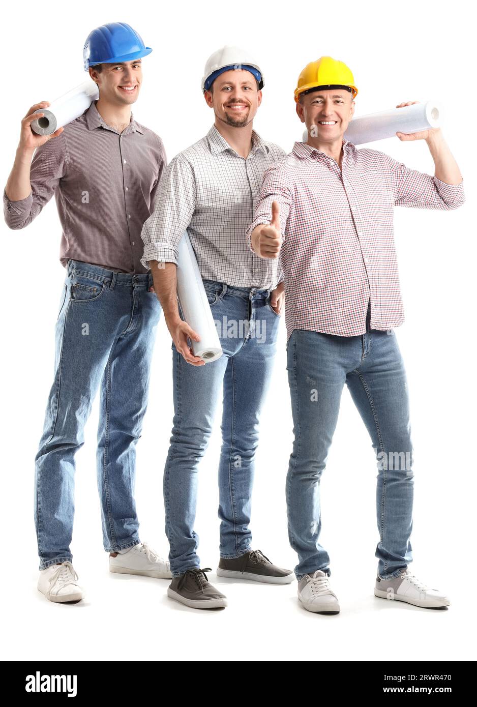 Team of male builders with wallpapers on white background Stock Photo ...