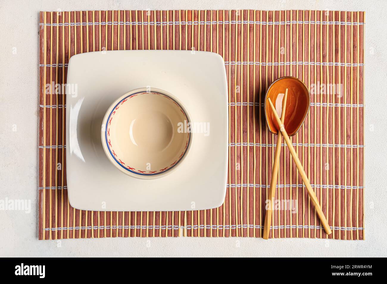 Chinese table setting on light background Stock Photo - Alamy