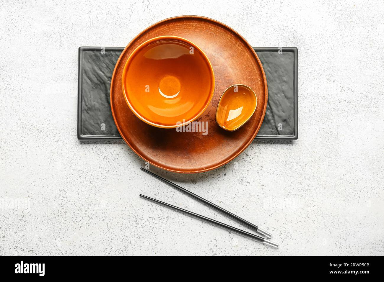 Chinese table setting on light background Stock Photo - Alamy