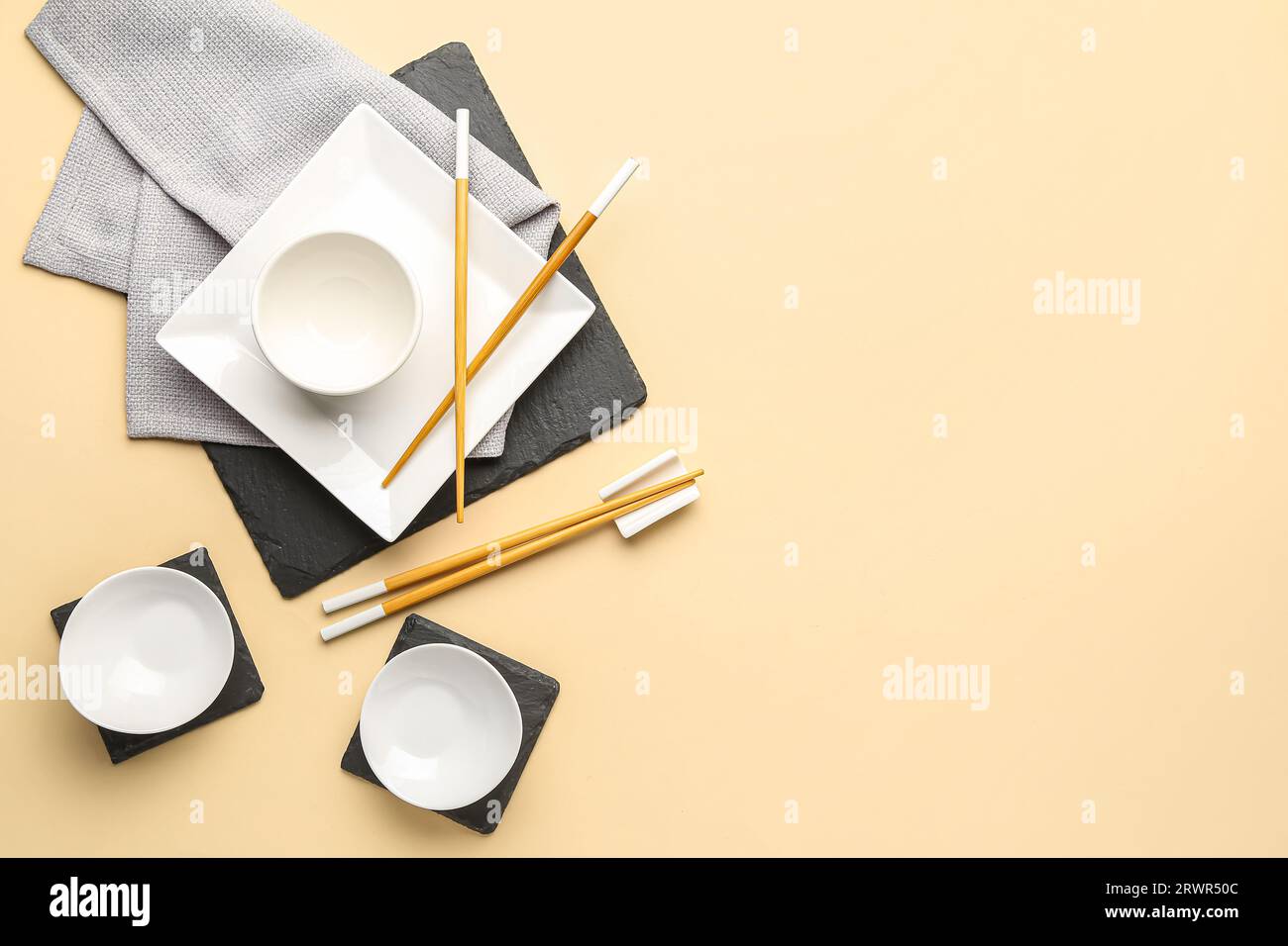 Chinese table setting on light background Stock Photo - Alamy