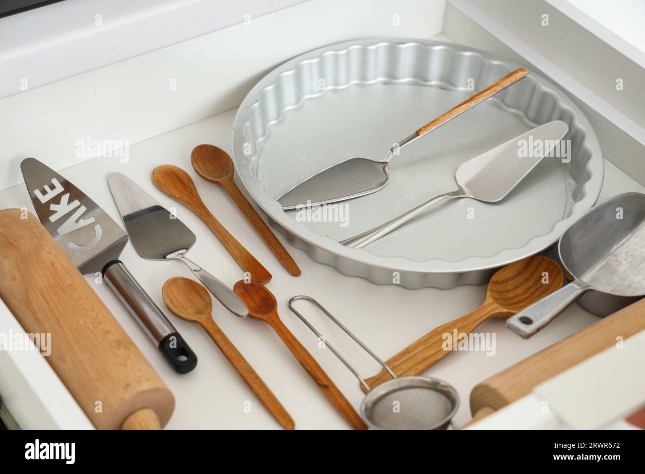 Set of utensils for bakery in drawer at kitchen Stock Photo - Alamy