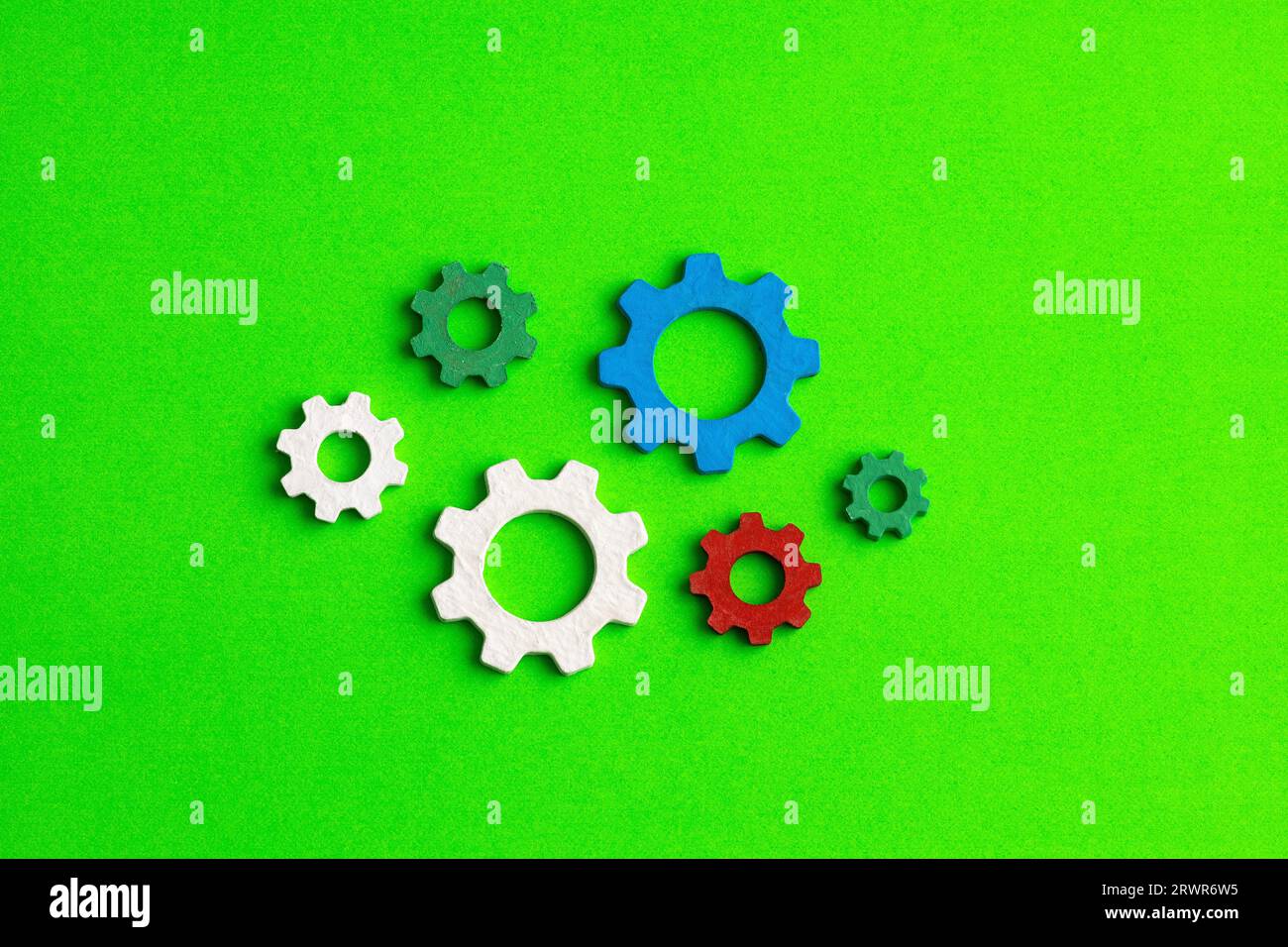 Business process and workflow automation - Gears on green background ...
