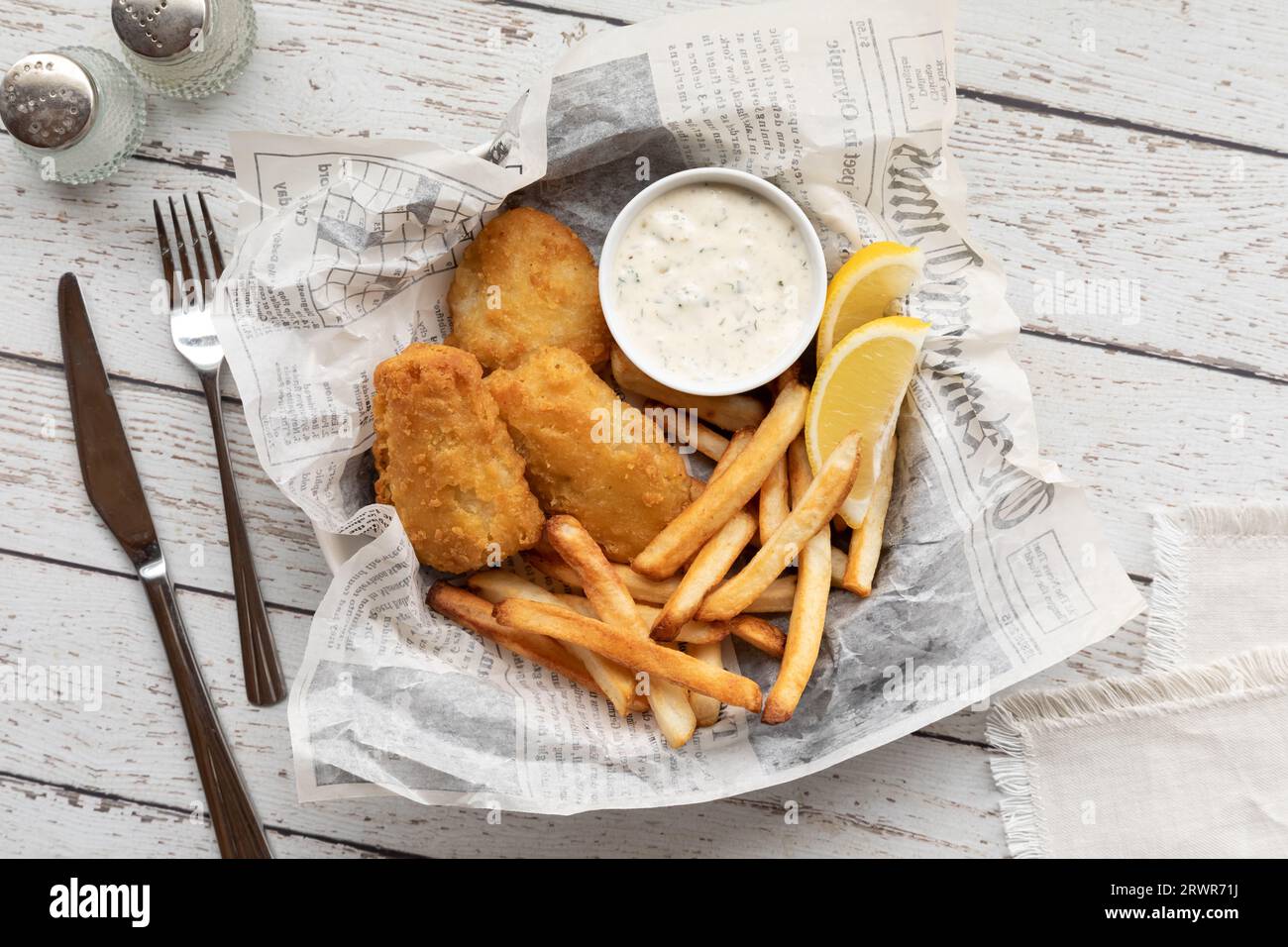 Fresh fish on newspaper hi-res stock photography and images - Alamy