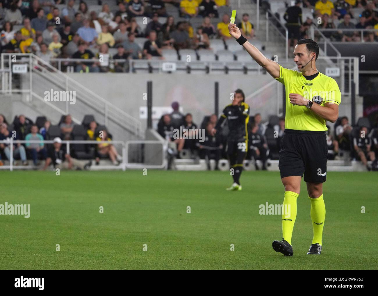 COLUMBUS, OH - SEPTEMBER 20: Match referee Ismir Pekmic issues a yellow ...