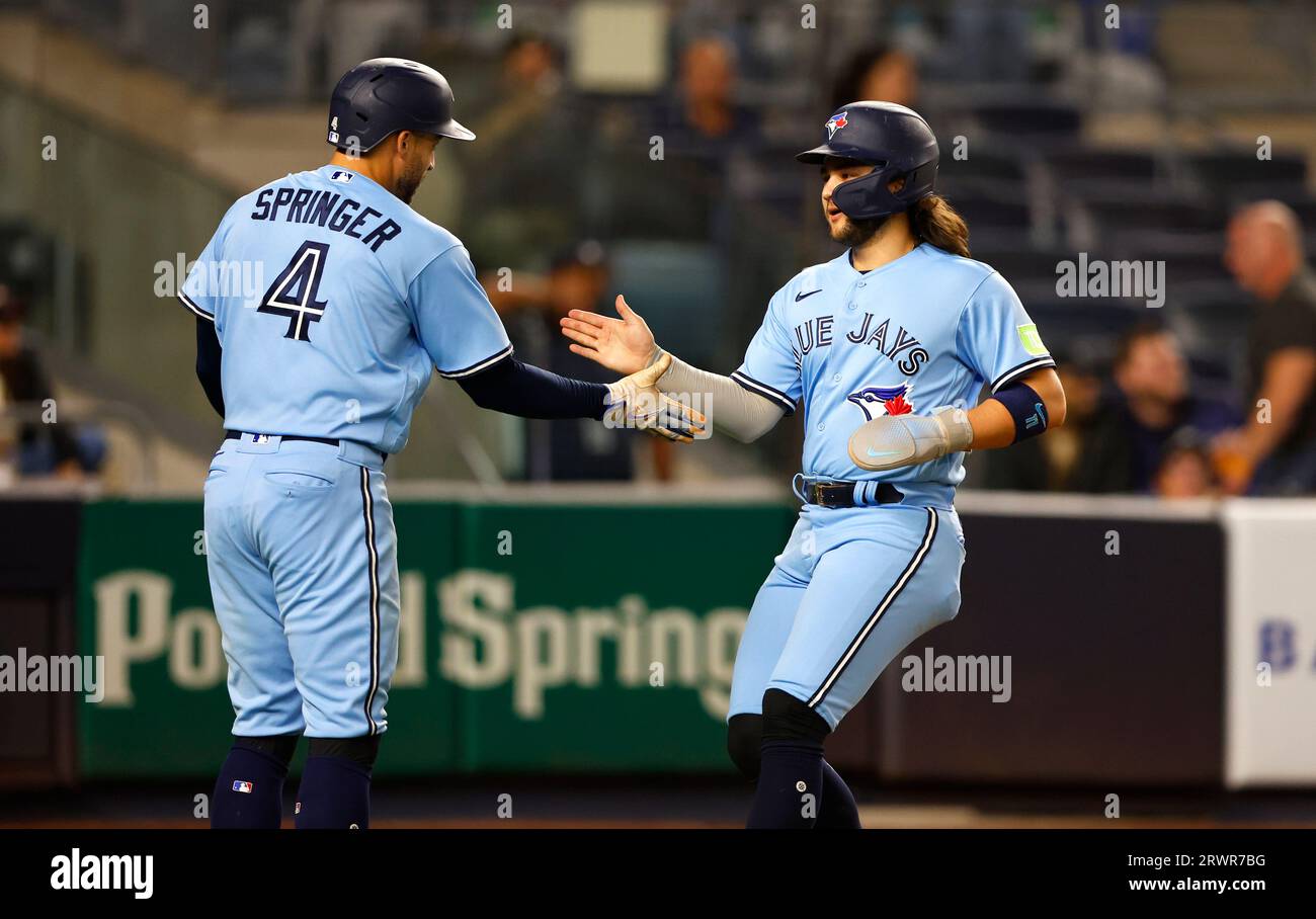 Toronto Blue Jays' George Springer (4) and Bo Bichette celebrate after ...