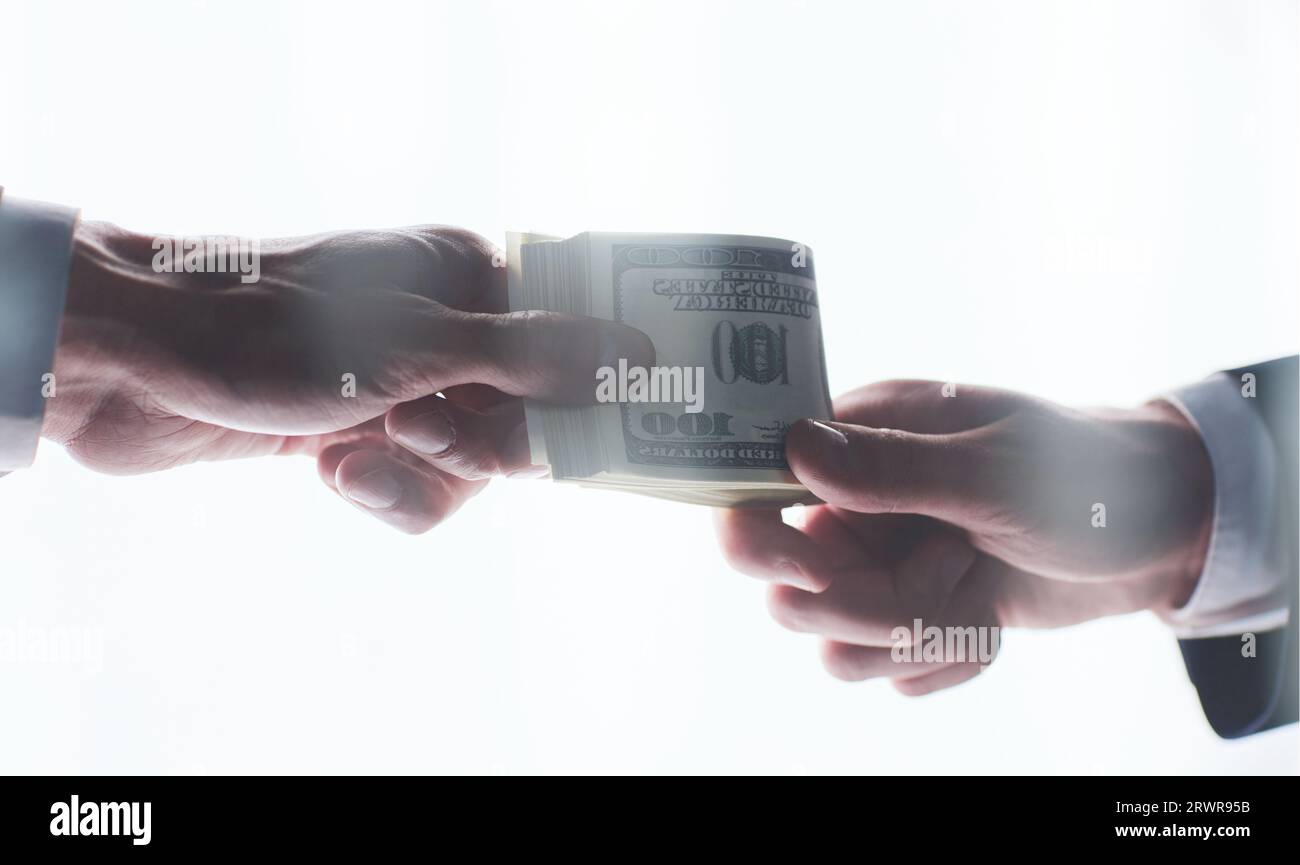 Hand giving money - United States Dollars. Hand receiving money from ...