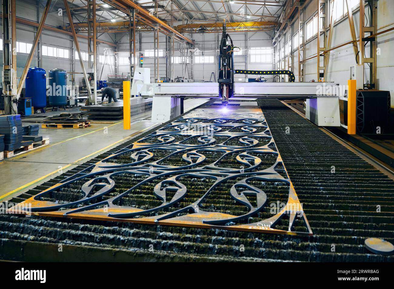 Portal plasma cutting machine operates with metal sheet Stock Photo - Alamy