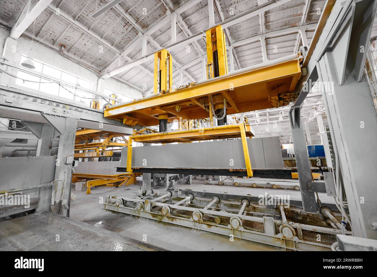 Operating equipment at manufacturing industrial plant Stock Photo - Alamy