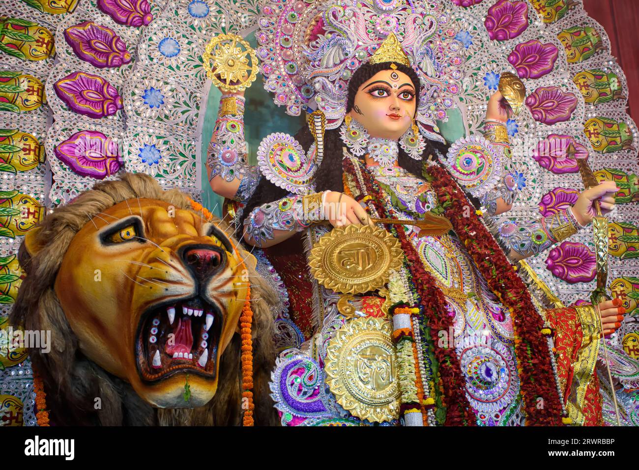 Goddess devi Jagadhatri idol decorated at a puja pandal in Kolkata ...