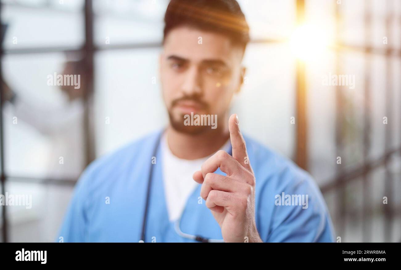 Serious teacher pointing finger in hi-res stock photography and images ...