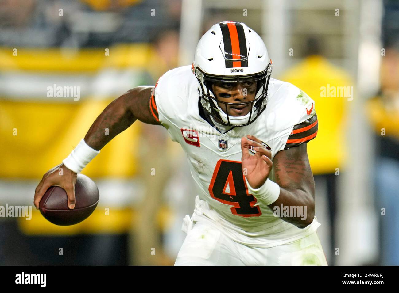 Cleveland Browns quarterback Deshaun Watson (4) is pressured out of the ...