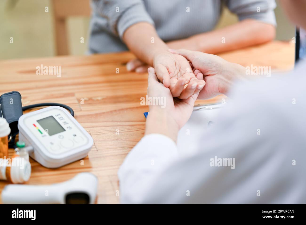 Close-up hand image of an old lady is being diagnosed and checked for ...