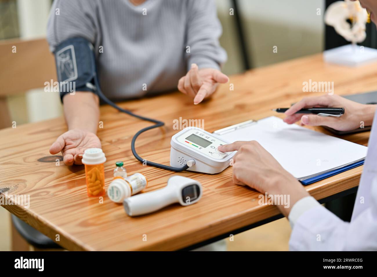 Close-up image of an old lady is being measured for her heart rate and ...