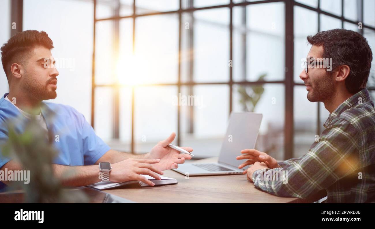 Medical assistant talking ill patient hi-res stock photography and ...