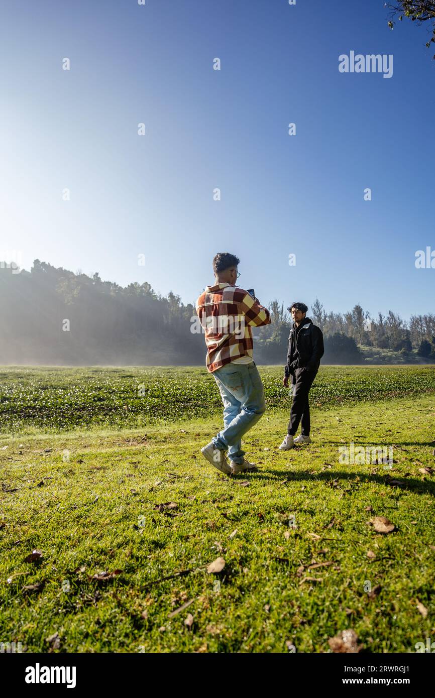 children running in the field Stock Photo - Alamy