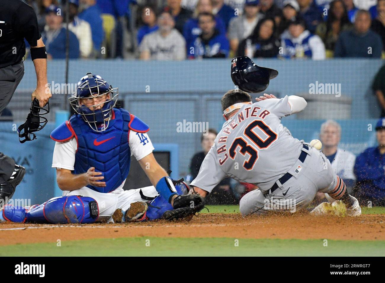 Detroit Tigers' Kerry Carpenter, right, scores on a single by Andy ...