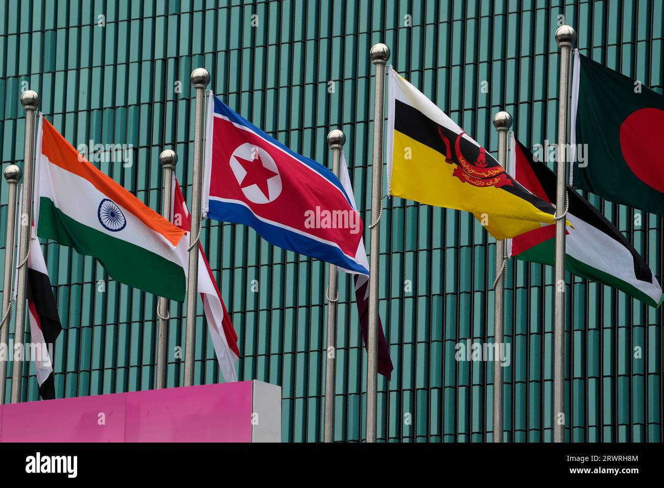 Flags of participating countries, among them North Korea, India, and ...
