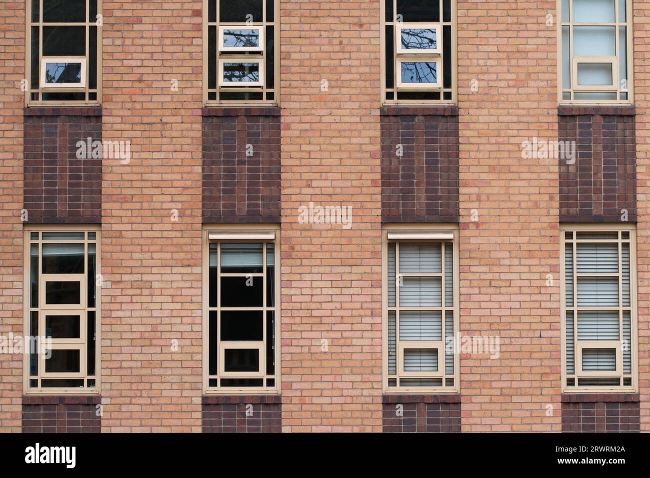 Abstract architecture and building design patterns with glass windows and brick walls, Melbourne ...