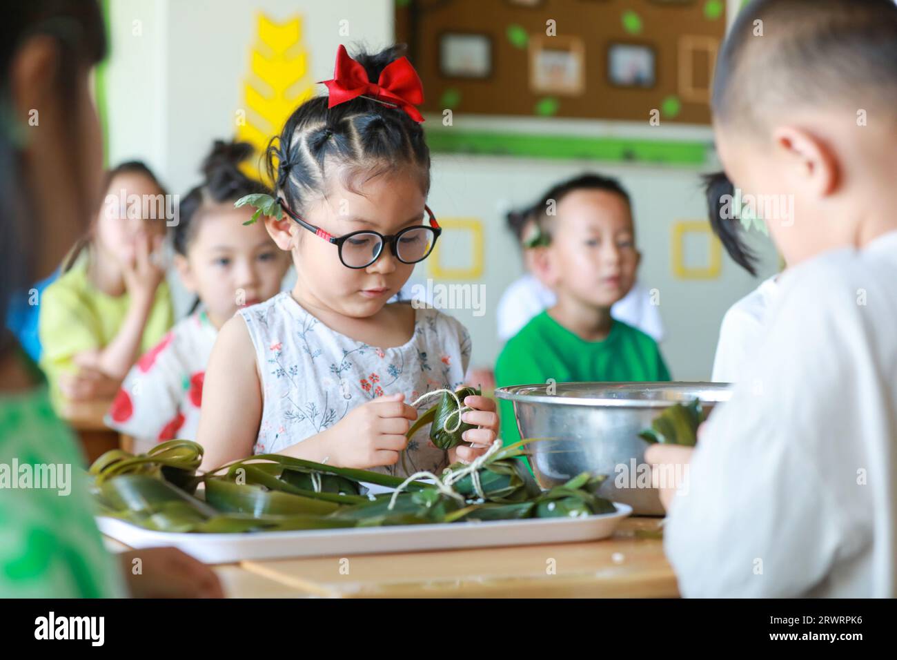 LUANNAN COUNTY, China - June 2, 2022: Kindergarten teachers teach ...