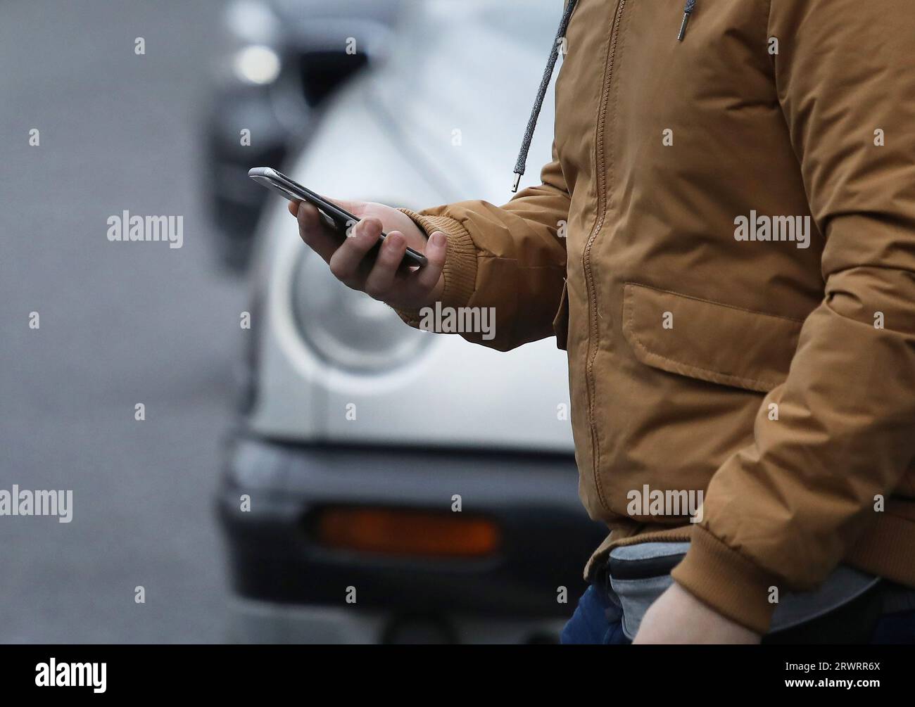 File photo dated 03/02/20 of a person using their phone. Five companies ...