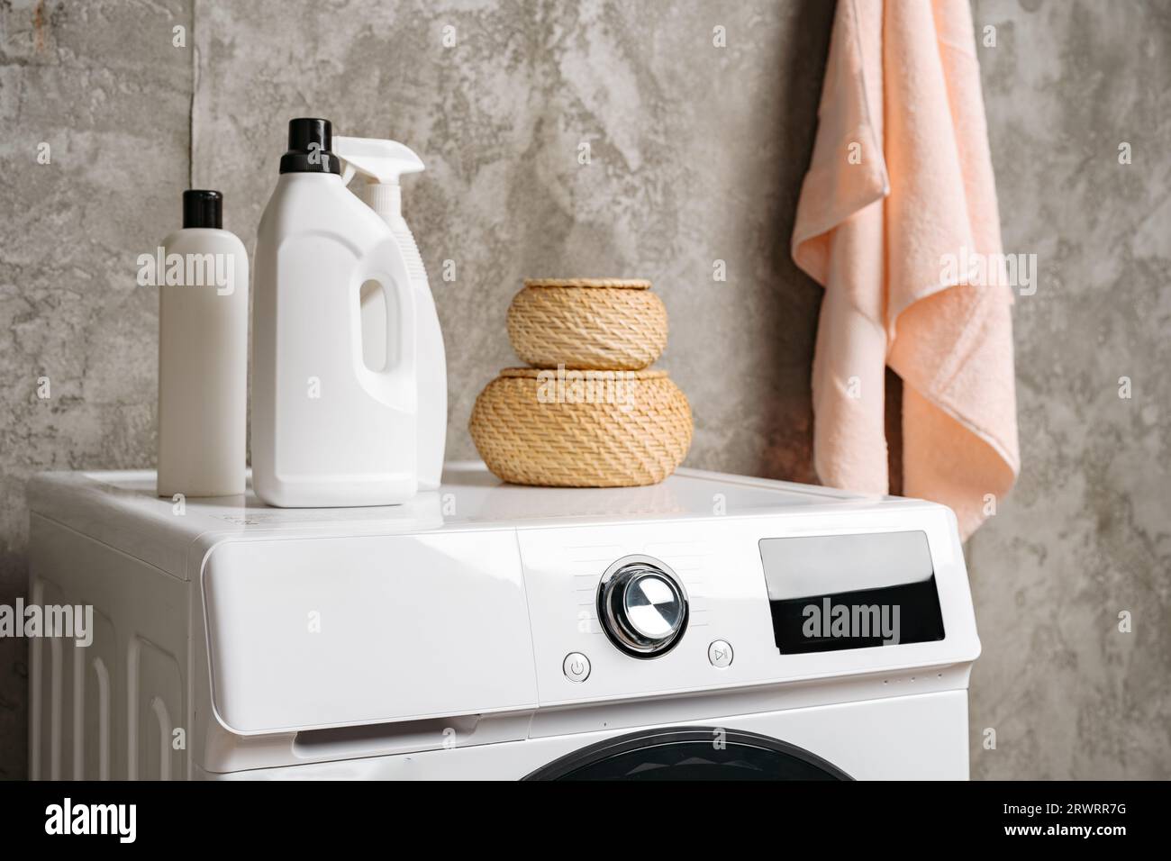 Washing liquid detergents on washing machine in a laundry room Stock ...