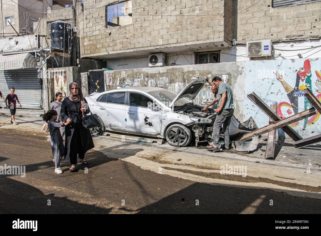 Jenin, Palestine. 20th Sep, 2023. Palestinians inspect the damage after ...