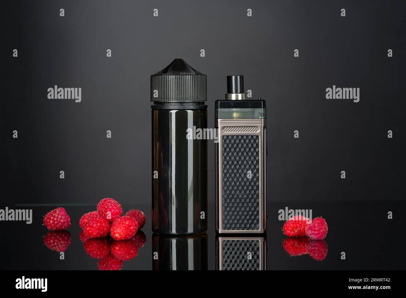 Vape smoking liquid with berry flavor close up Stock Photo - Alamy