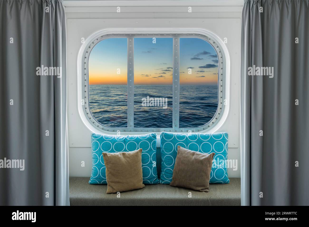 View through the cabin window of a cruise ship at evening mood, sea ...
