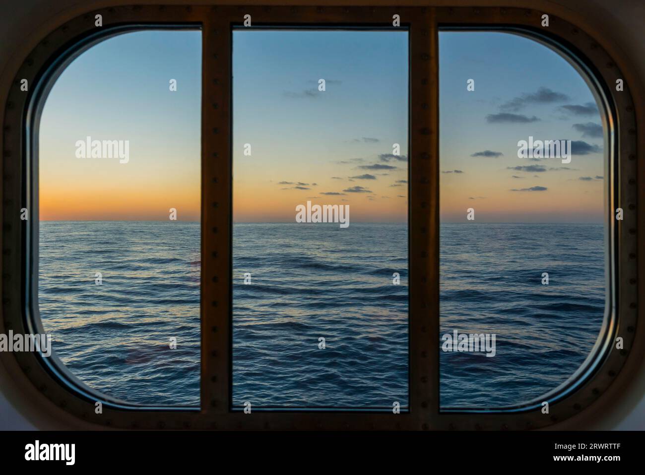 View through the cabin window of a cruise ship at evening mood, sea ...