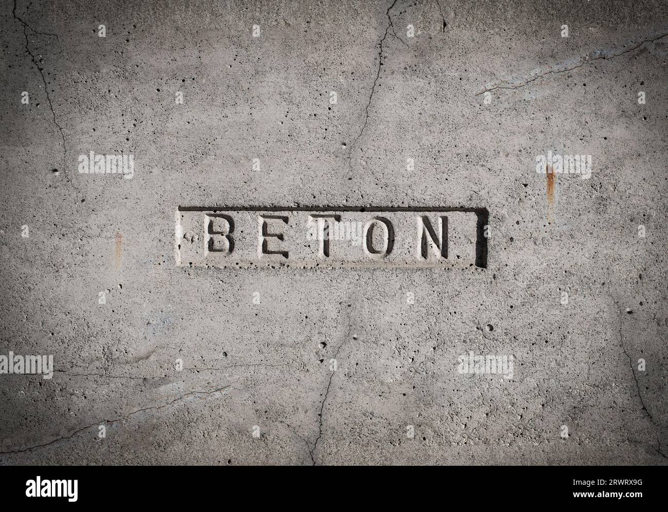 Grey textured concrete wall labeled Baton. High quality photo Stock ...