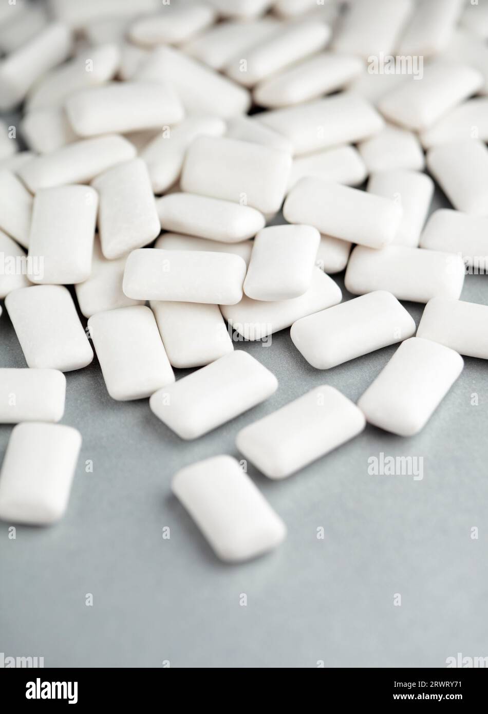 White rectangular chewing gum on grey Stock Photo - Alamy