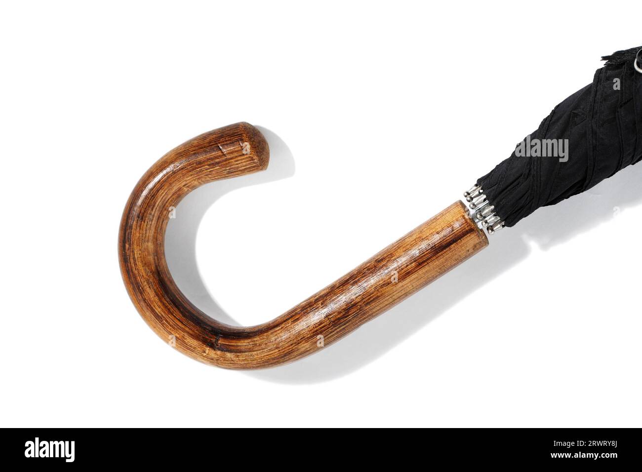 Handle of an old umbrella Stock Photo - Alamy