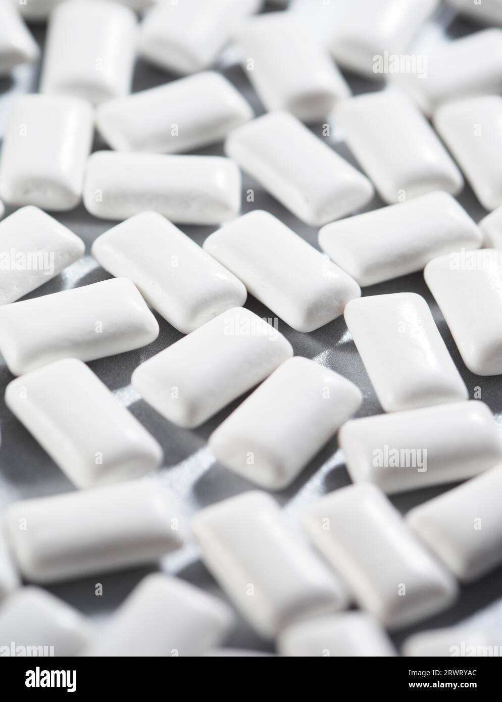 White rectangular chewing gum on grey Stock Photo - Alamy