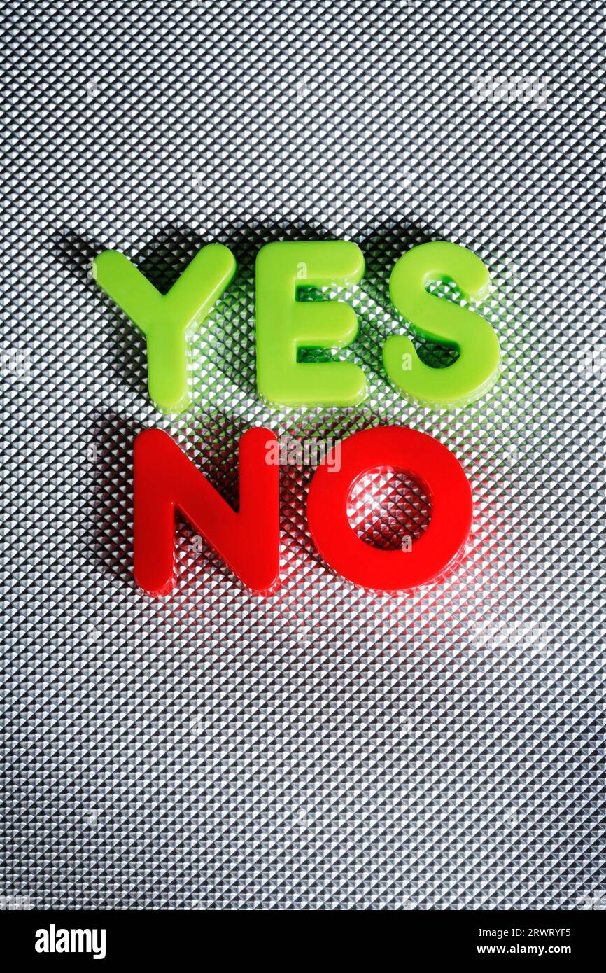The words YES and NO written with plastic toy letters Stock Photo - Alamy