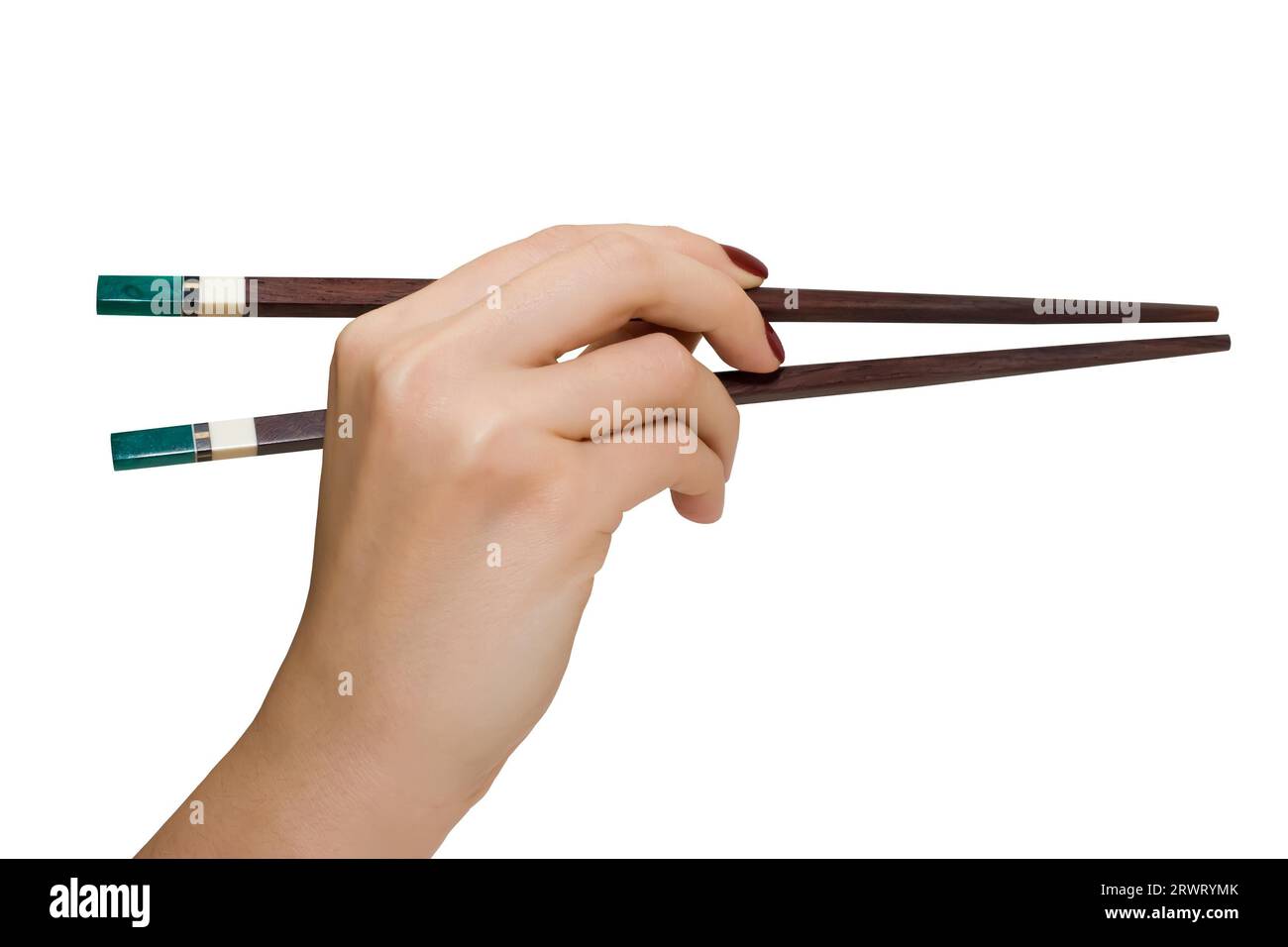 Chopsticks in a hand, isolated on white Stock Photo - Alamy