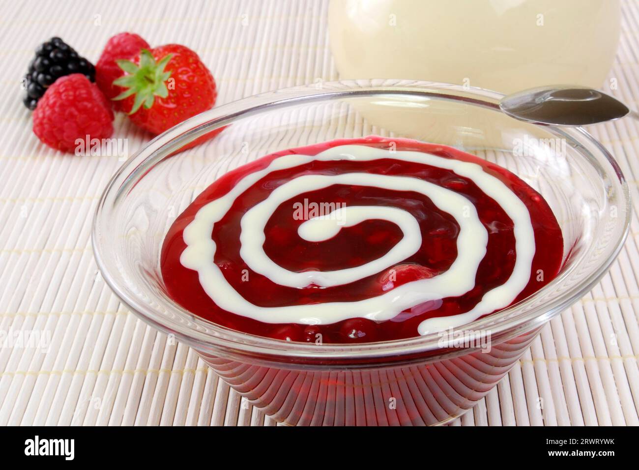 Red fruit jelly with vanilla sauce Stock Photo - Alamy