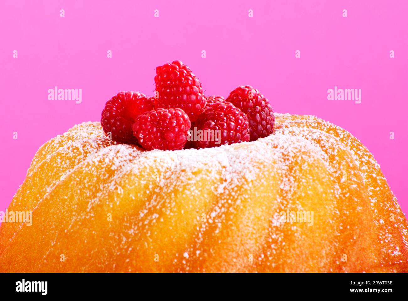 Sponge cake with raspberries Stock Photo - Alamy