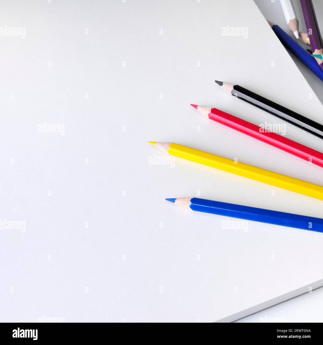 Colouring block and coloured pencils Stock Photo - Alamy