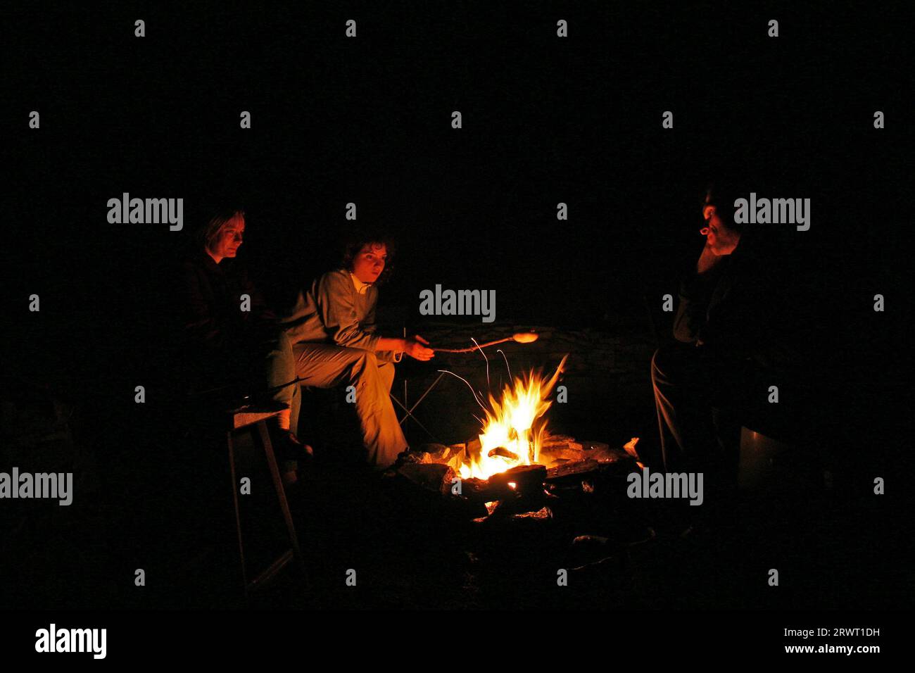 One person around fire hi-res stock photography and images - Alamy