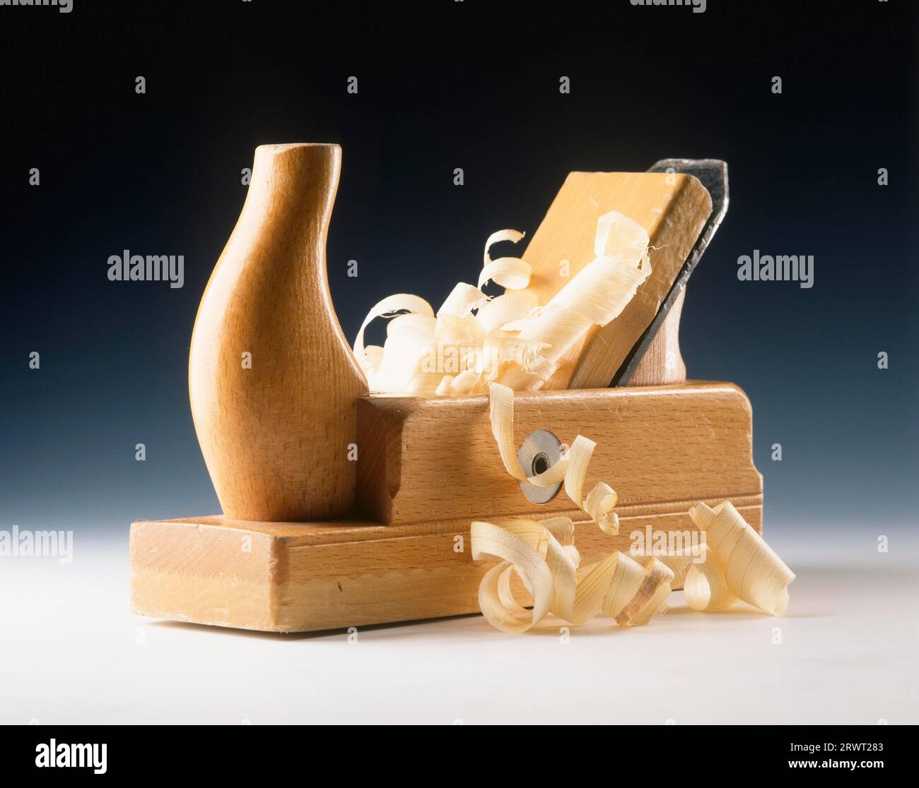 Joiner's plane with wood shavings Stock Photo - Alamy