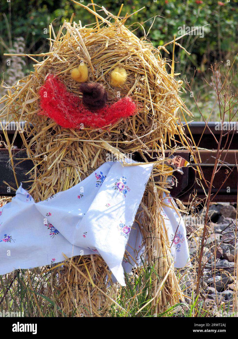 Funny straw doll on the railway track Stock Photo - Alamy
