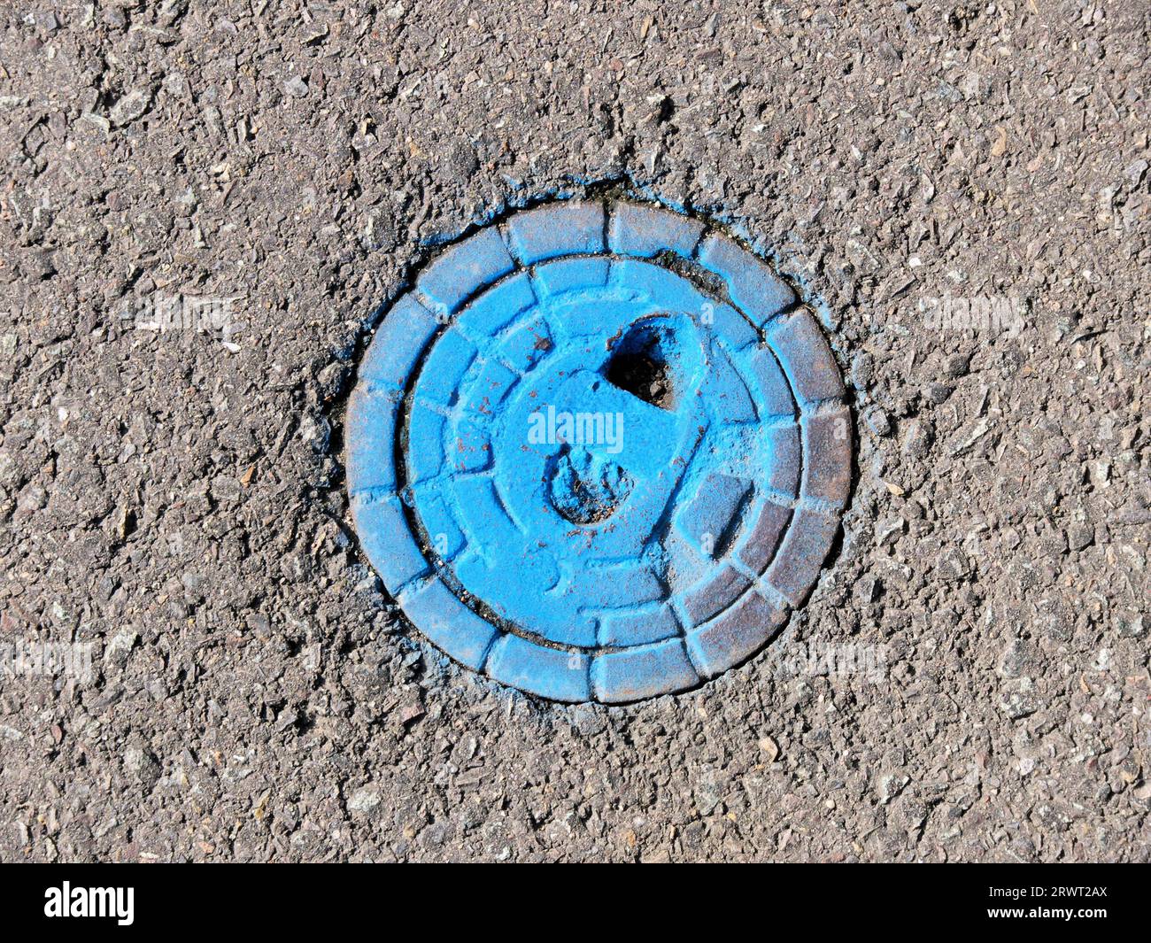Blue underground hydrant Stock Photo - Alamy