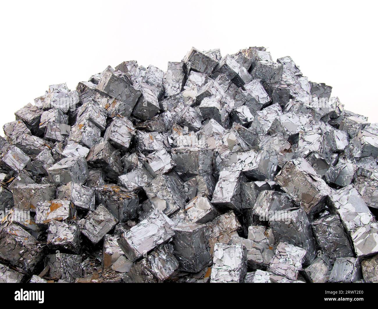 Many stacked silver-coloured steel scrap cubes Stock Photo - Alamy