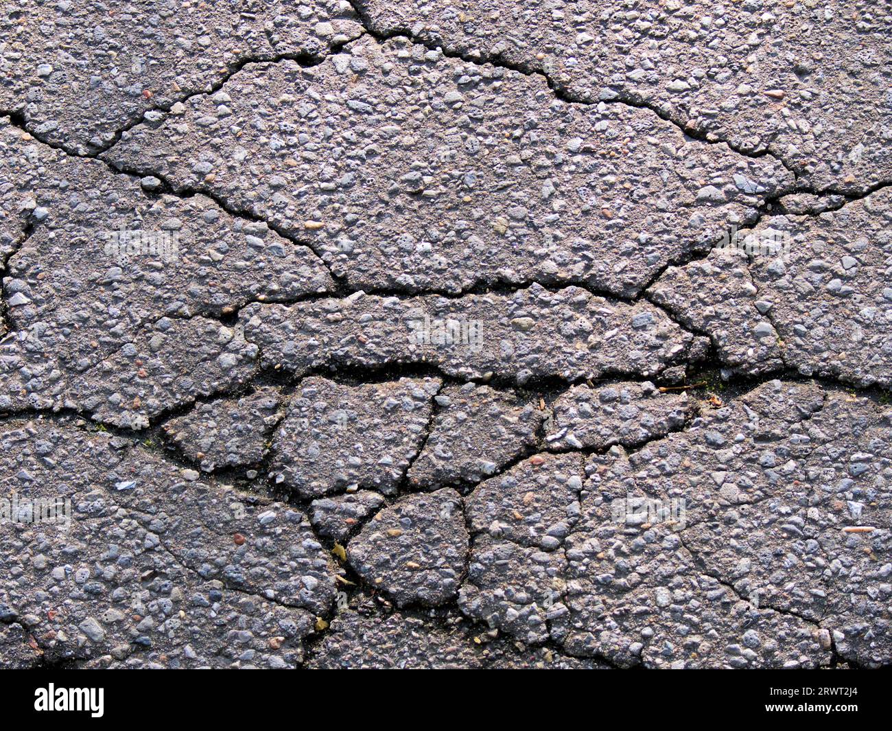 Road damage in road surface Stock Photo - Alamy